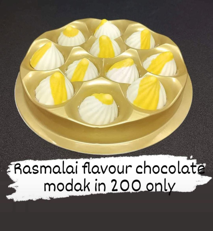 Yellow Rasmai Rasmalai Modak, Taste : Sweet, Soft, Packaging Type ...